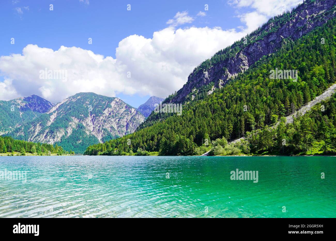 Landscape at the Plansee in Tyrol, Austria. Turquoise colored lake with ...