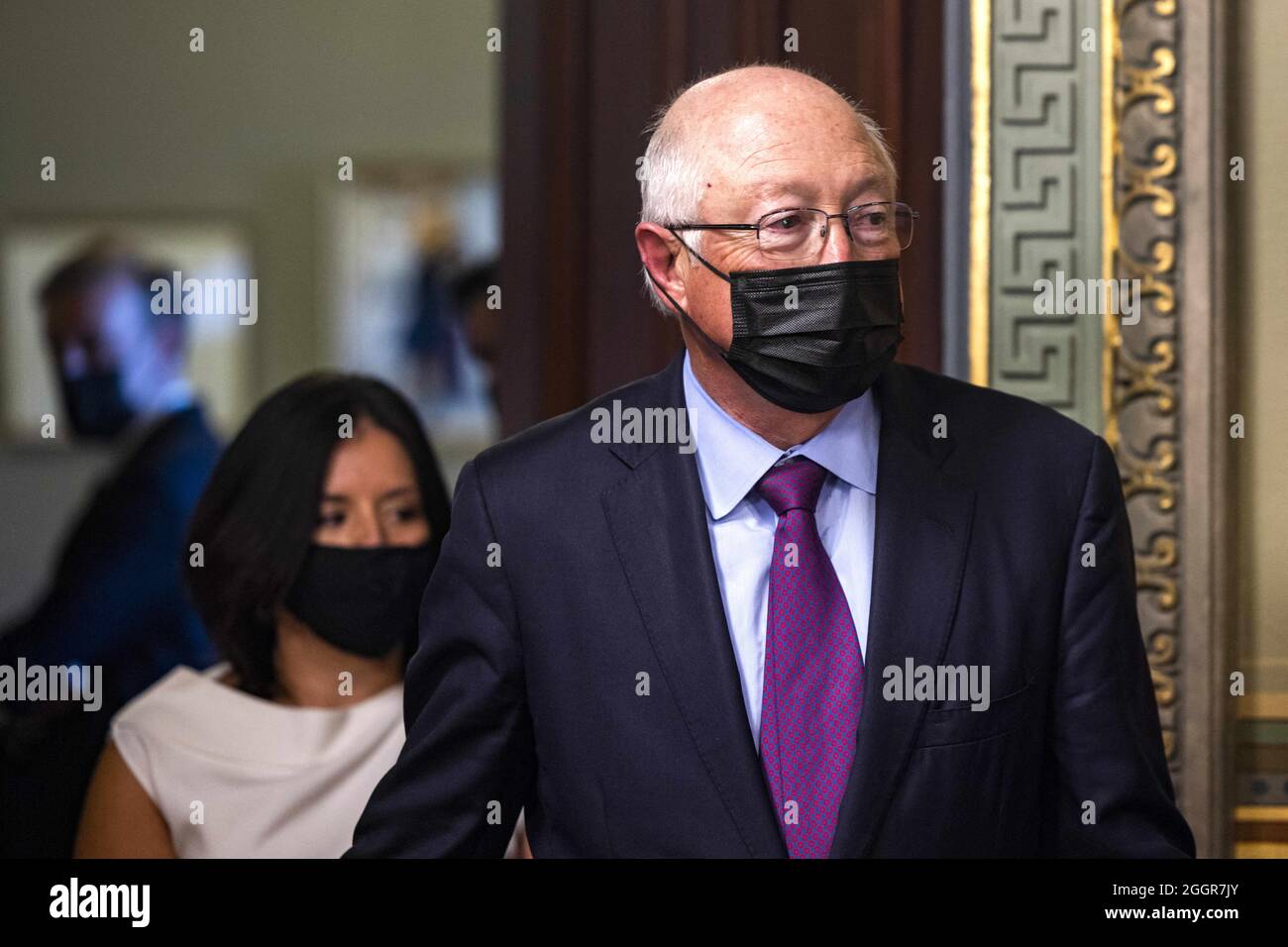 Ken Salazar (R) prepares to ceremonially sworn in as the US Ambassador ...