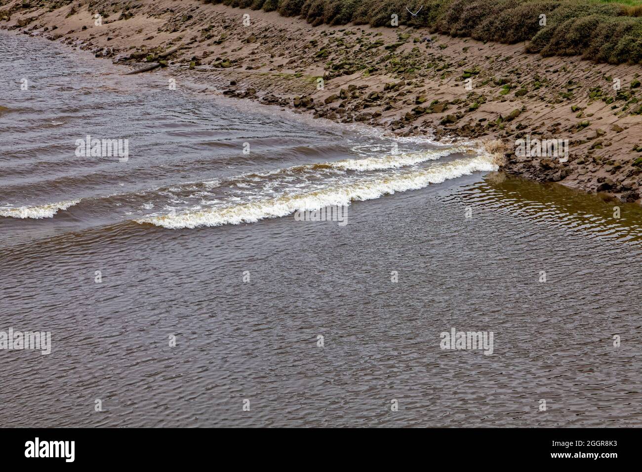Breaking waves at the channel sides on tne Dee Tidal Bore in New Cut ...