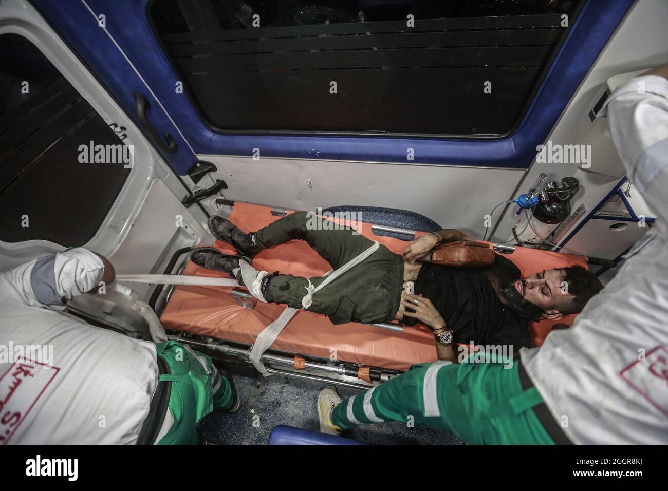 Gaza City, Palestinian Territories. 02nd Sep, 2021. A paramedic treats ...