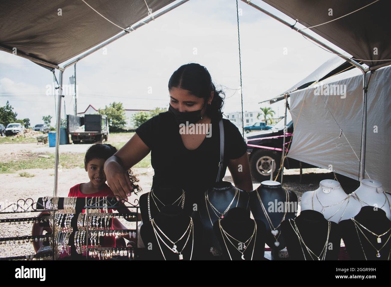 A jewelry vendor at the market, Belmopan, Belize Stock Photo - Alamy