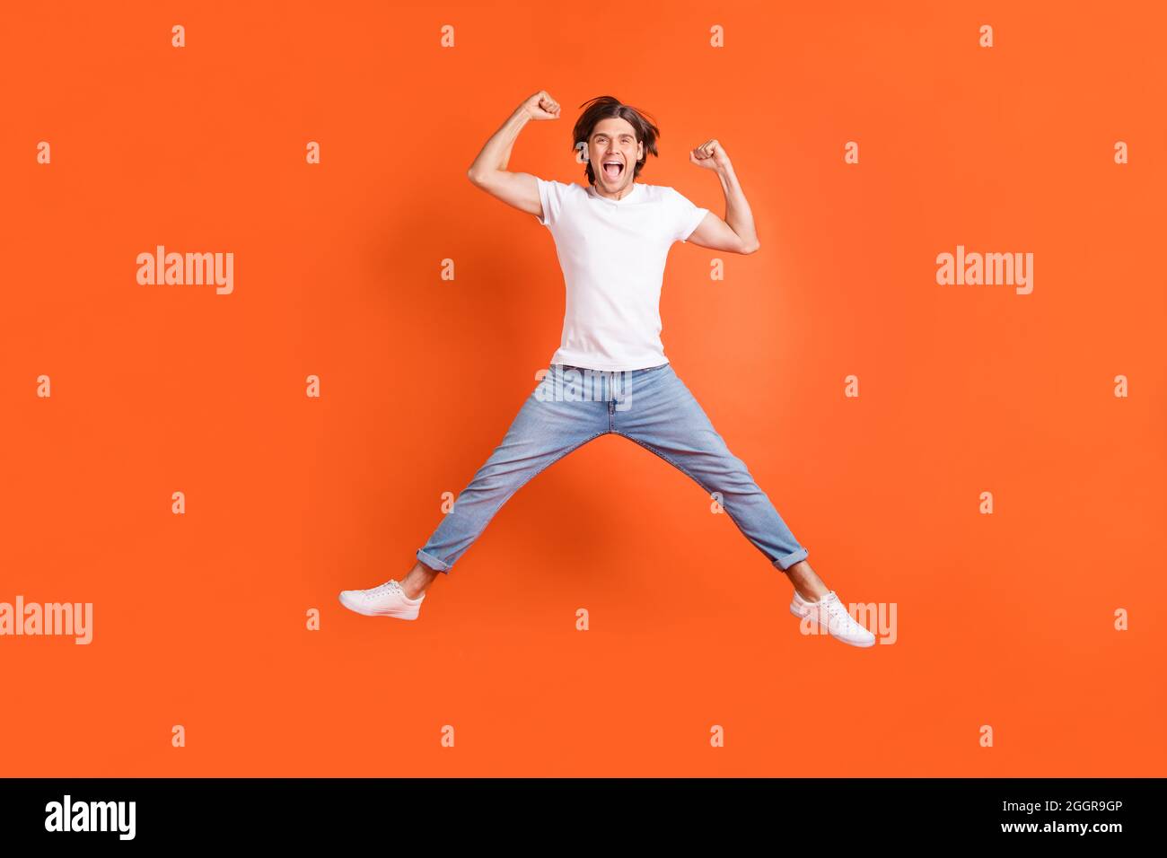 Full body photo of happy cheerful crazy man jump up winner celebrate ...