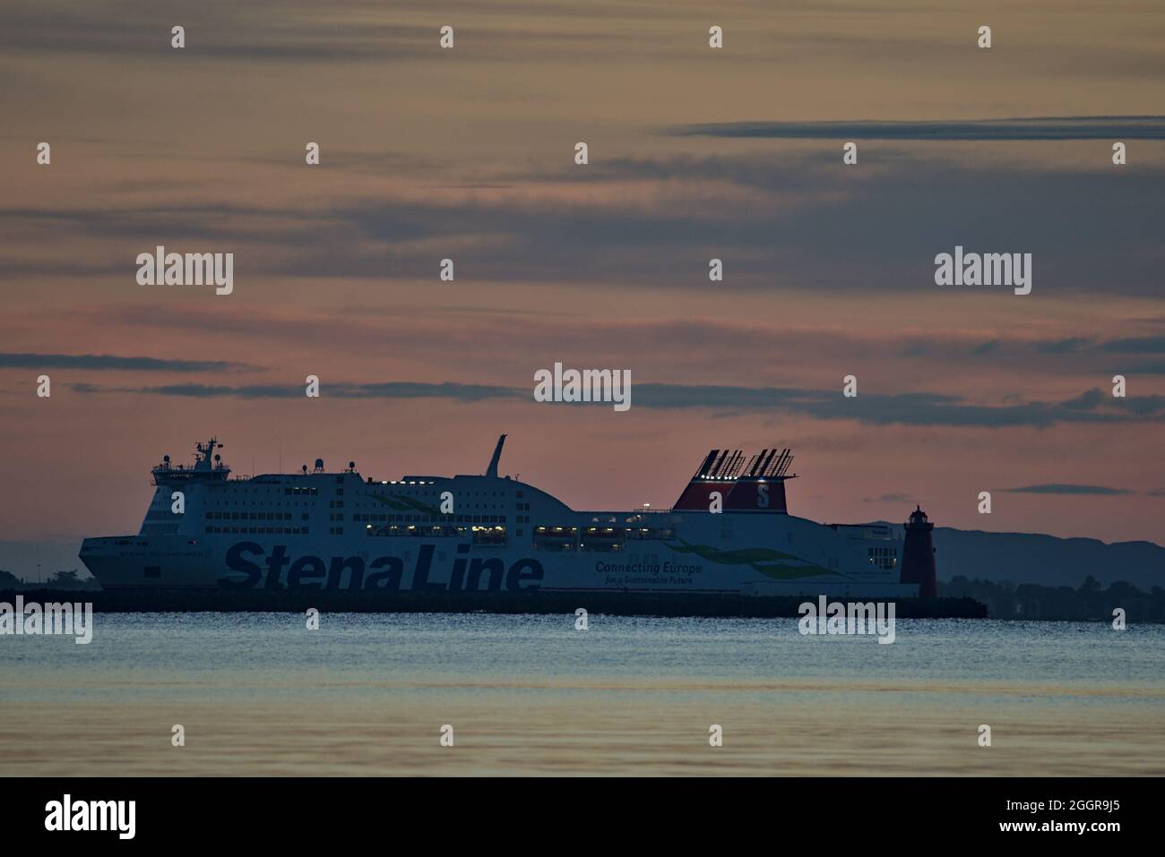 Cargo ship port sunrise hi-res stock photography and images - Alamy