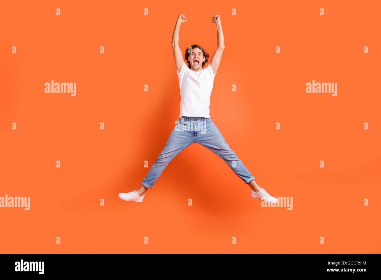 Full body photo of happy cheerful crazy man jump up winner celebrate ...
