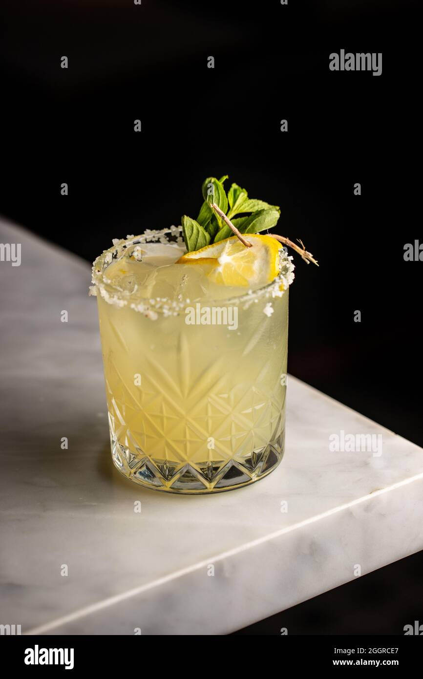 Vertical shot of an iced alcoholic cocktail in a small glass Stock ...
