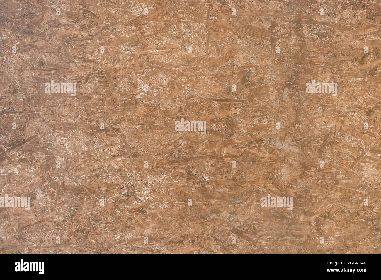 Brown chipboard abstract old pattern surface, dark pressed wood texture ...
