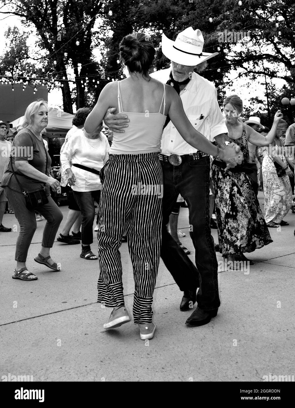 Couples dance at an outdoor music concert in the historic Plaza in ...