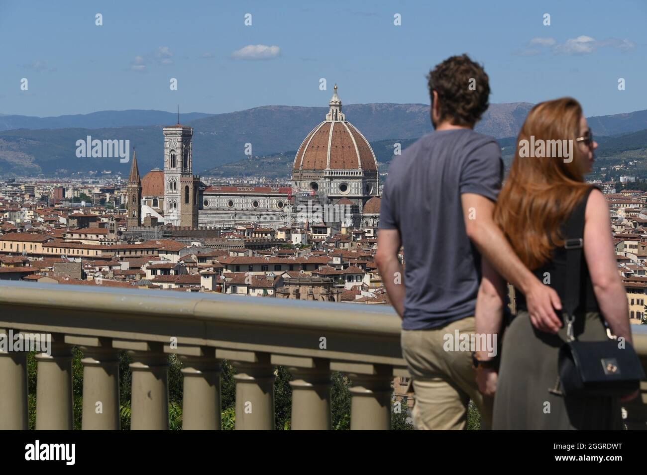 Florence, Italy. 2nd Sep, 2021. Tourists overlook the city of Florence ...