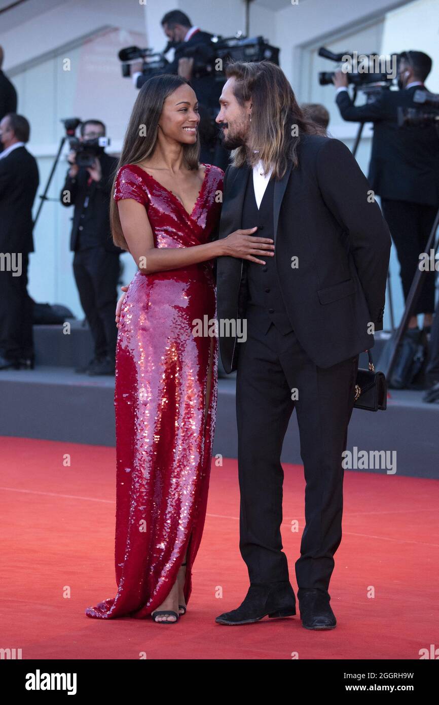 Zoe Saldana and Marco Perego attending E Stata La Mano Di Dio Premiere ...