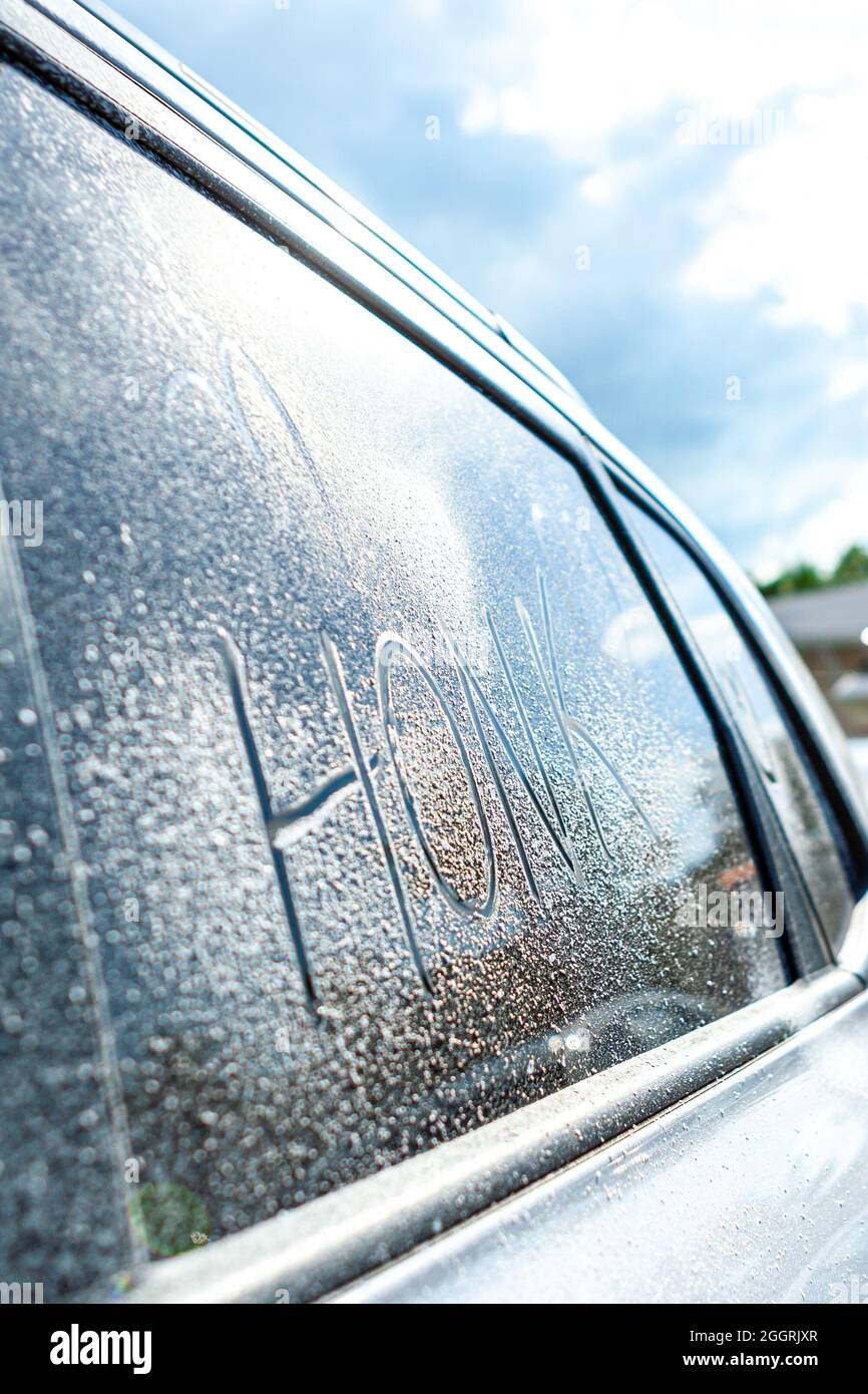 Word HONK written on the window of a car Stock Photo - Alamy