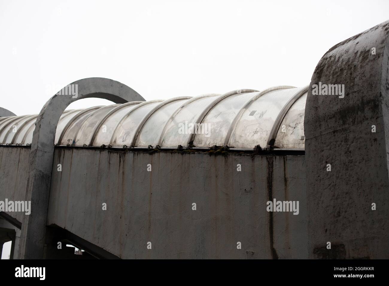 Pedestrian crossing over the highway. Tunnel over the road. The roof of ...