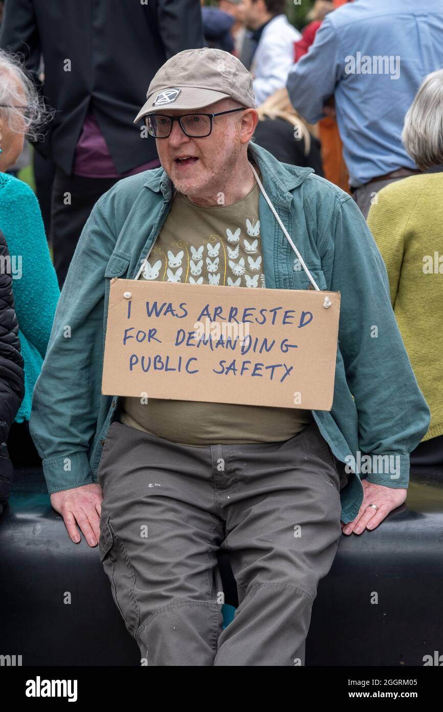 London, UK. 02nd Sep, 2021. A protester wears a sign saying I was ...