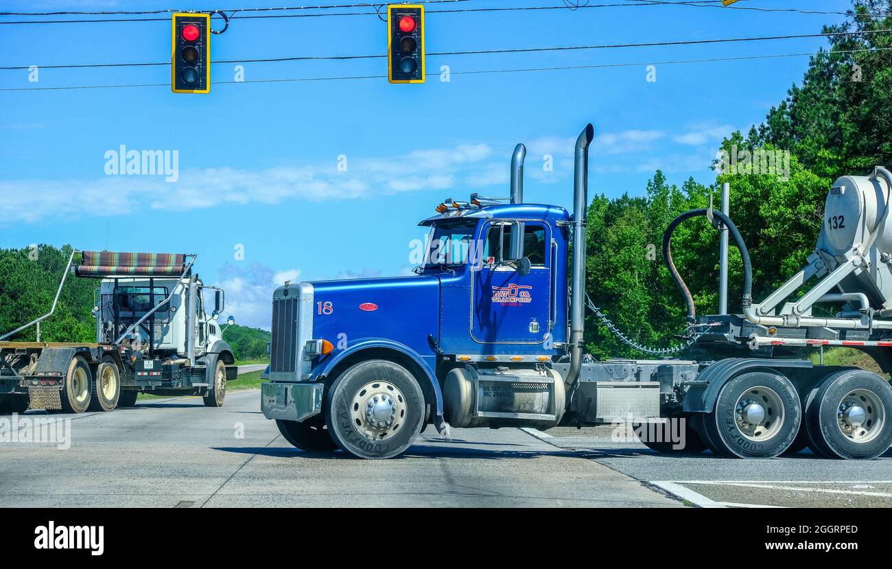 Trucks Crossing Intersection Stock Photo - Alamy