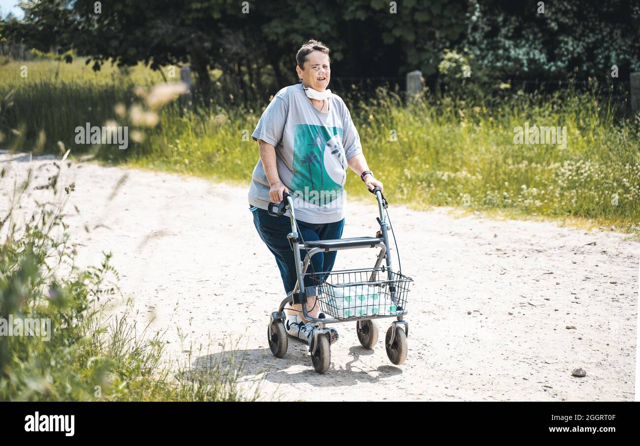 Overweight walking aid hi-res stock photography and images - Alamy
