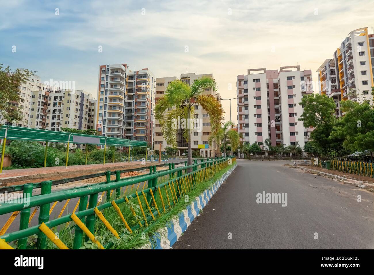 Commercial and residential apartment buildings with vehicles on city ...