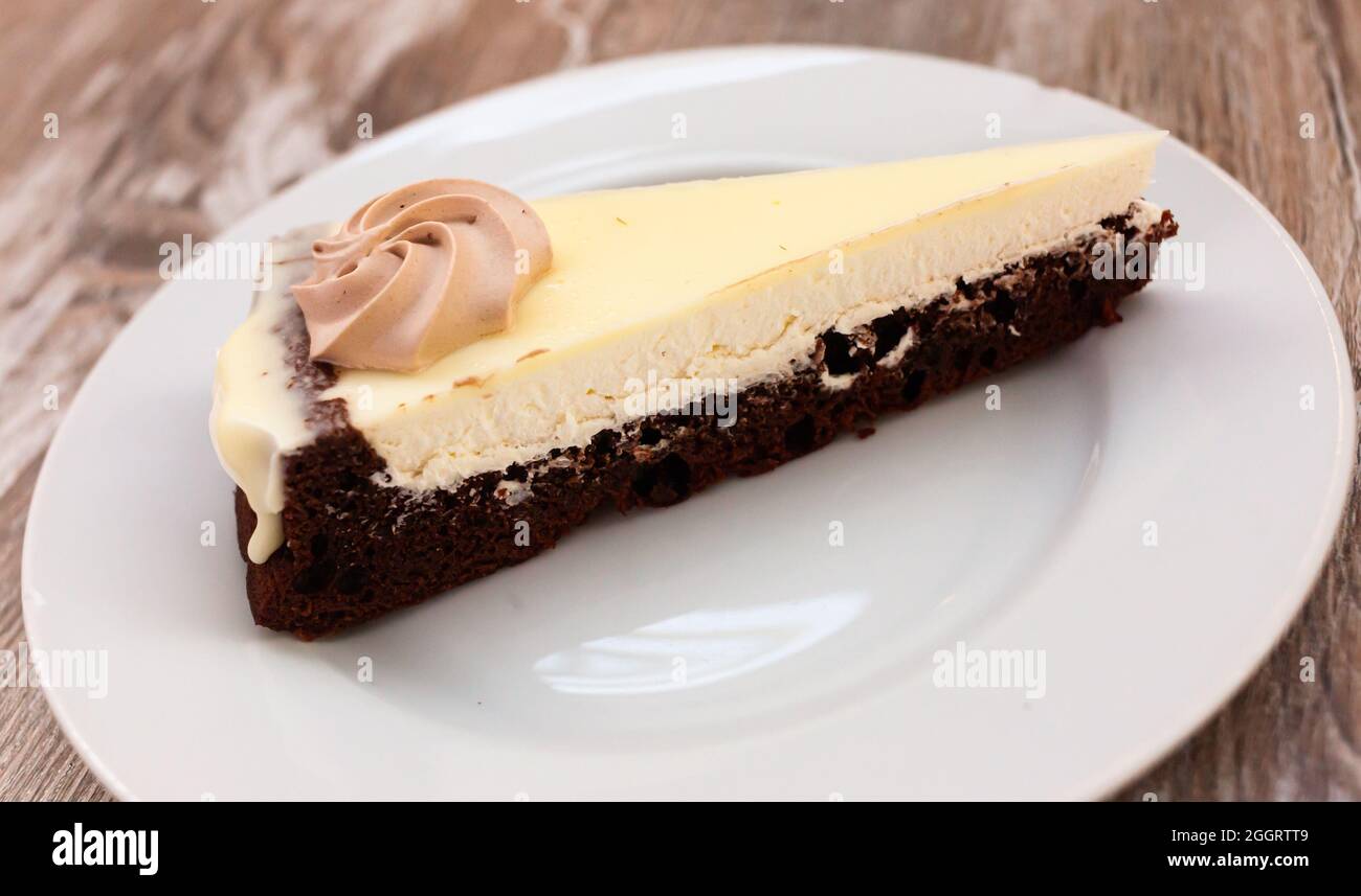 Traditional German pie from chocolate crust with fluffy caramel whipped ...