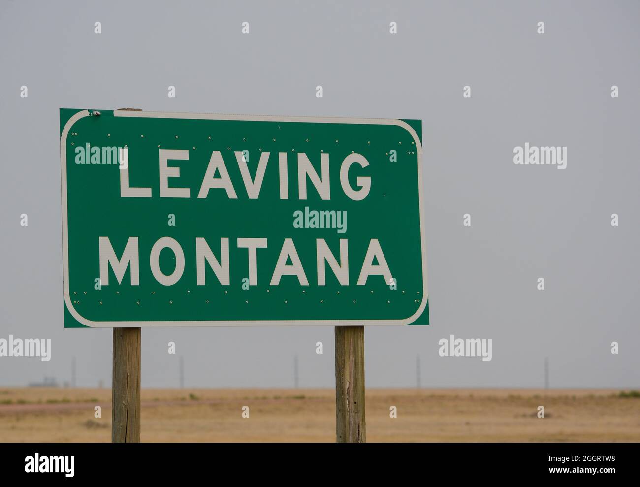 The state border sign, for leaving Montana Stock Photo - Alamy