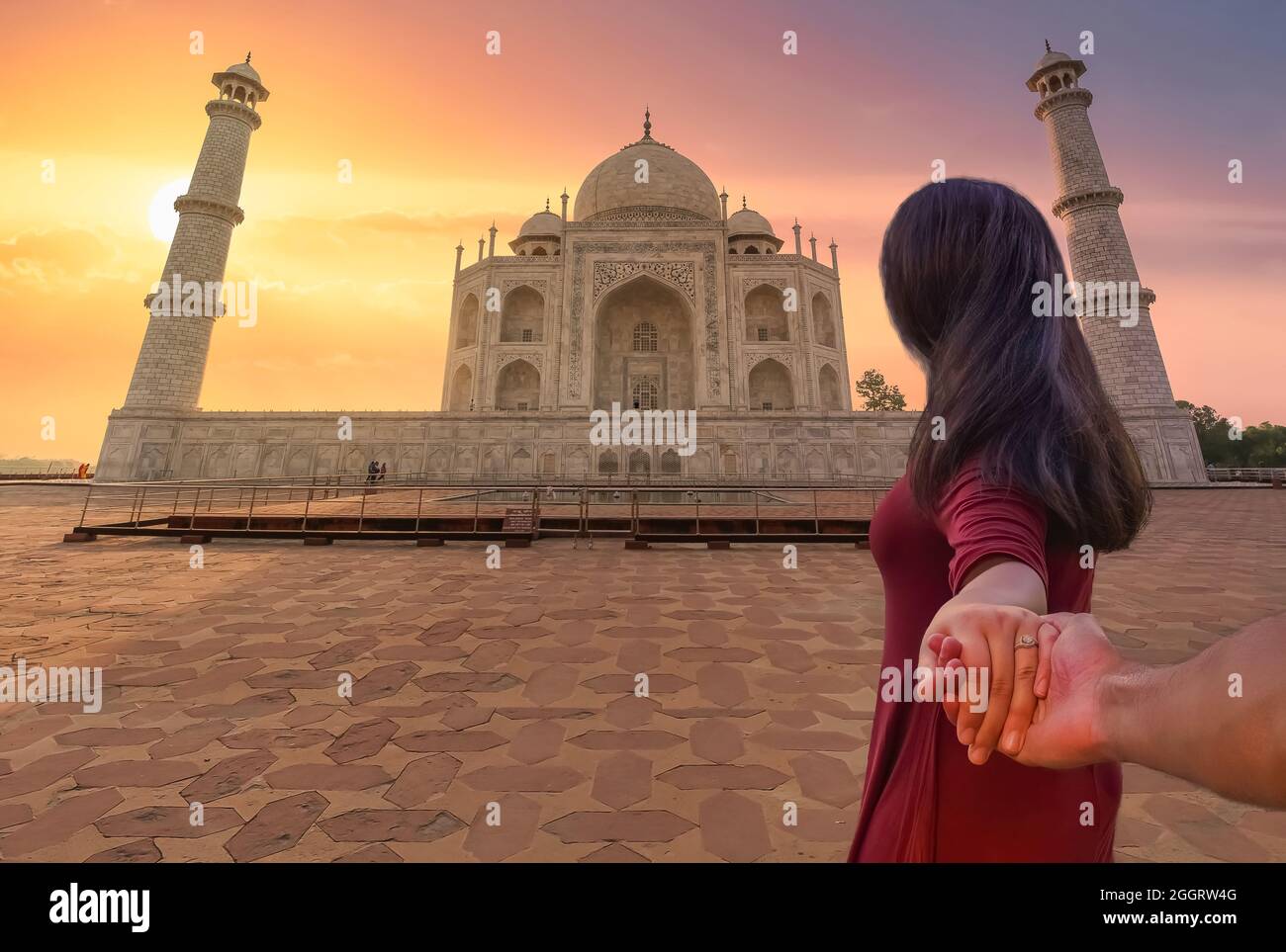 Female tourist hold hand at Taj Mahal Agra India historic monument at ...