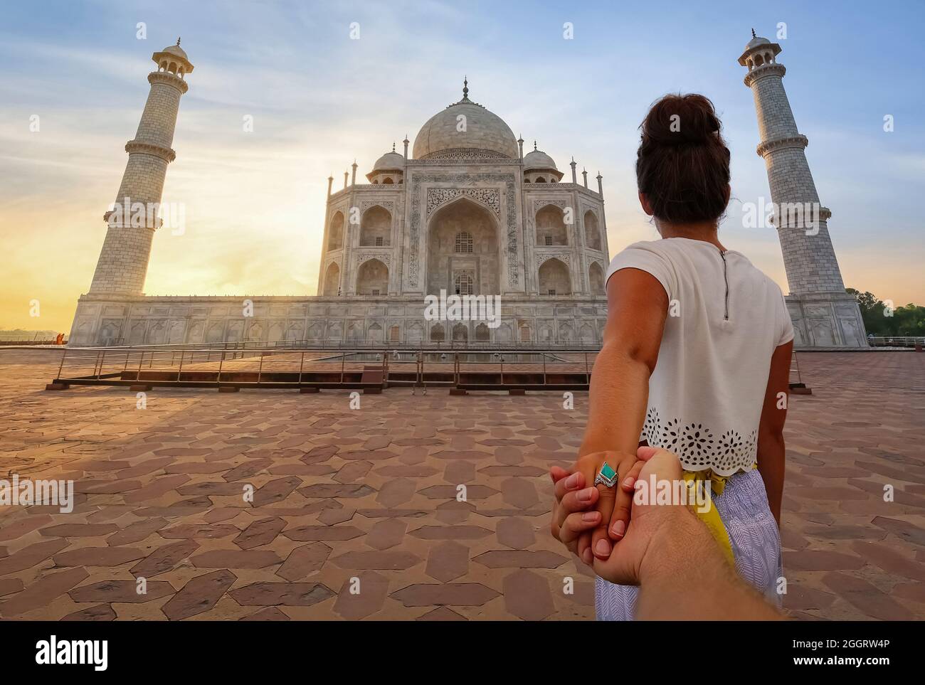 Female tourist hold hand at Taj Mahal Agra India historic monument at ...