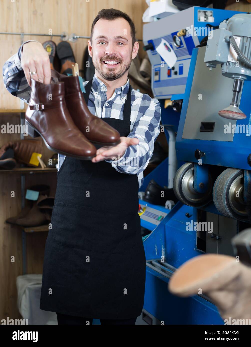 Ordinary worker displaying result of his work Stock Photo - Alamy