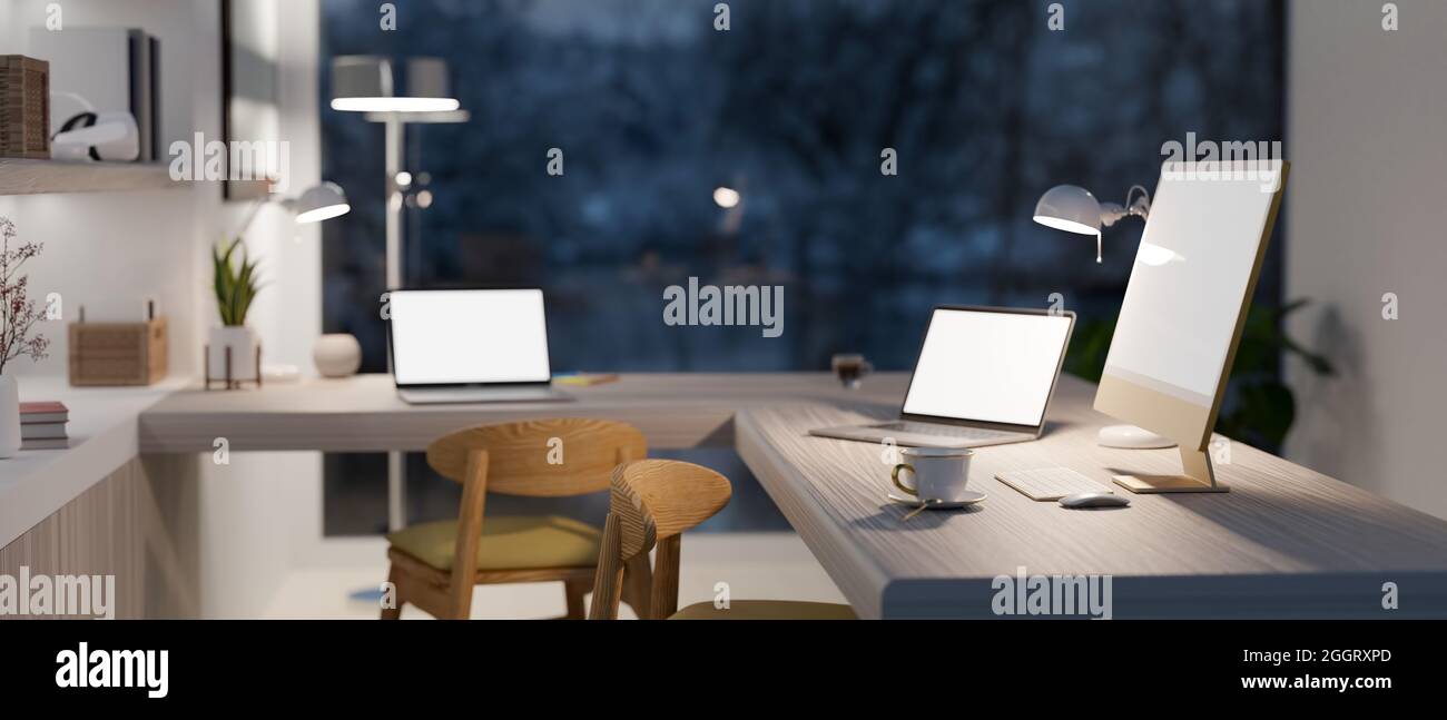 Modern workstation in luxury house with two laptop and computer blank ...