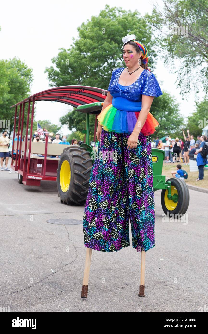 A woman on stilts in a parade at the Minnesota State Fair Stock Photo ...