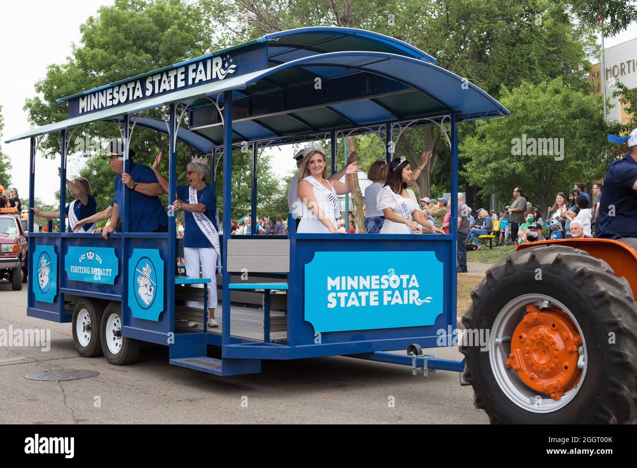 "Royalty" of the Minnesota State Fair being waving to crowd during a ...