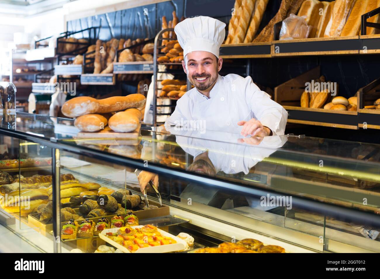 Professional baker is demonstrating assortment Stock Photo - Alamy