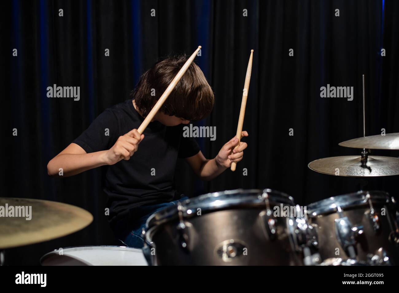 Children playing drums in school hi-res stock photography and images ...