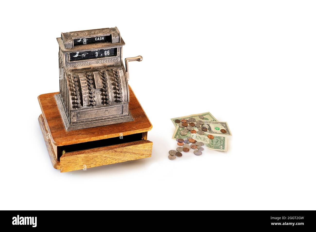 Antique style cash register with money coins and bills, isolated on ...