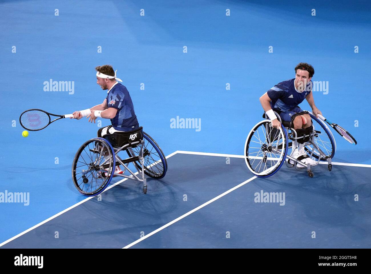 Great Britain's Alfie Hewett (left) and Gordon Reid in action in the ...