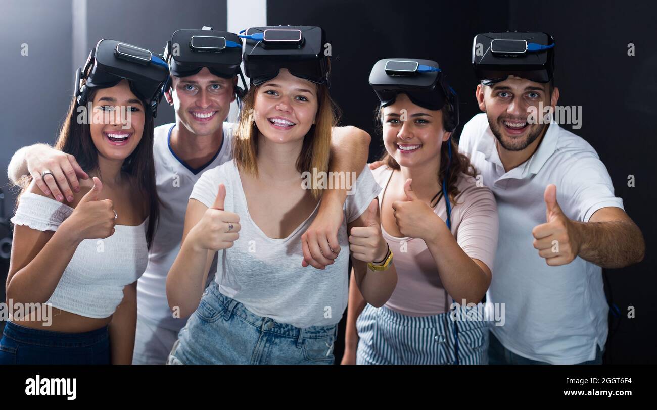 people using virtual reality glasses delighted with videogames and new ...