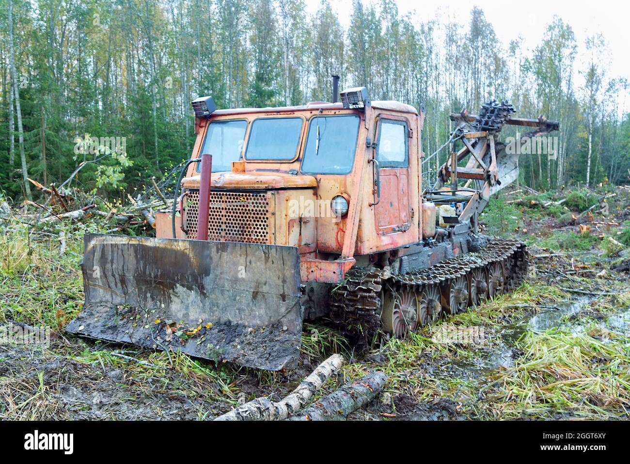 Forestry. Trenching plough, plow ditcher (backhoe; diker) works in the ...