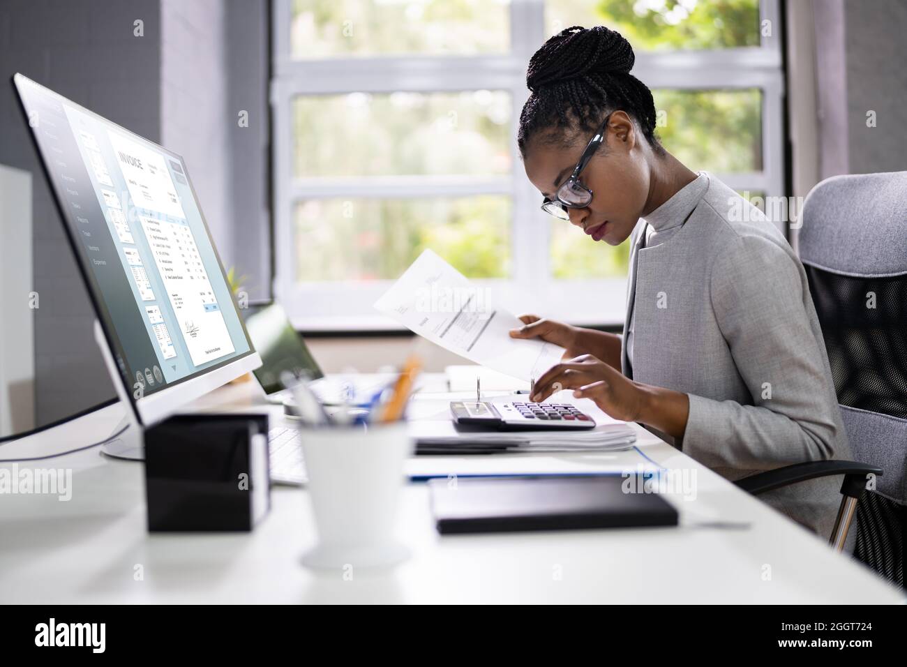 Accountant Using Electronic Invoice Or Bill In Cloud Stock Photo - Alamy