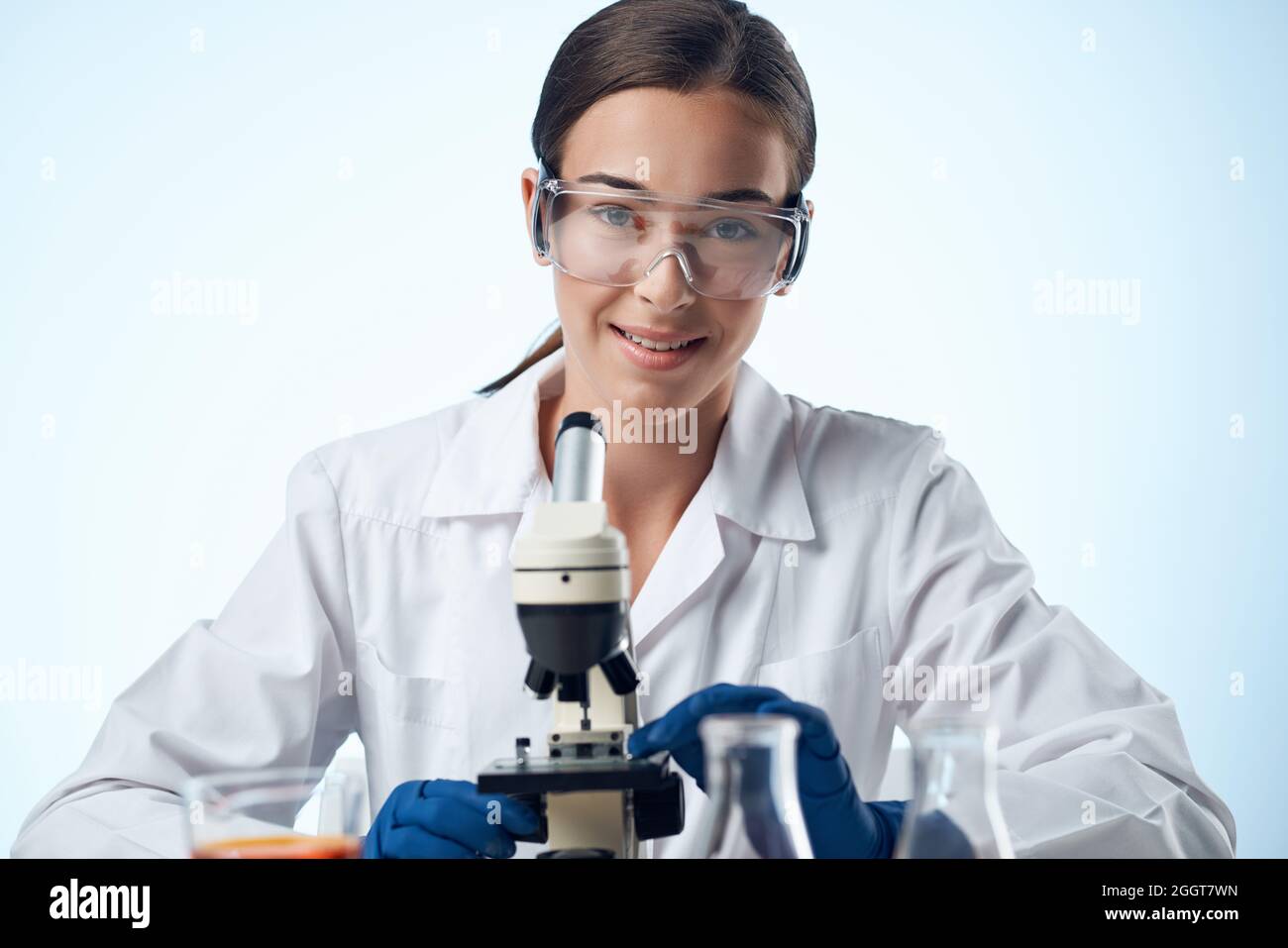 female doctor laboratory microscope study closeup Stock Photo - Alamy