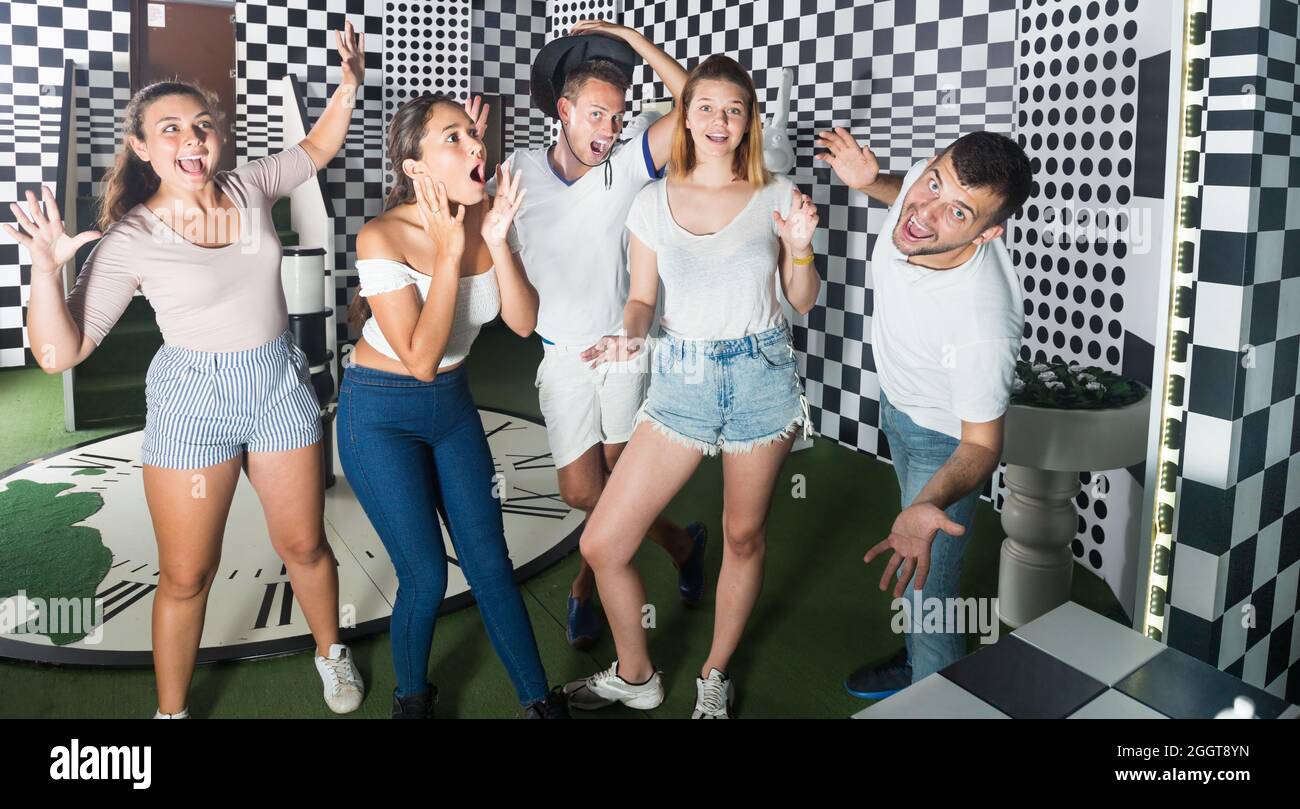Young people having fun in escape room Stock Photo - Alamy