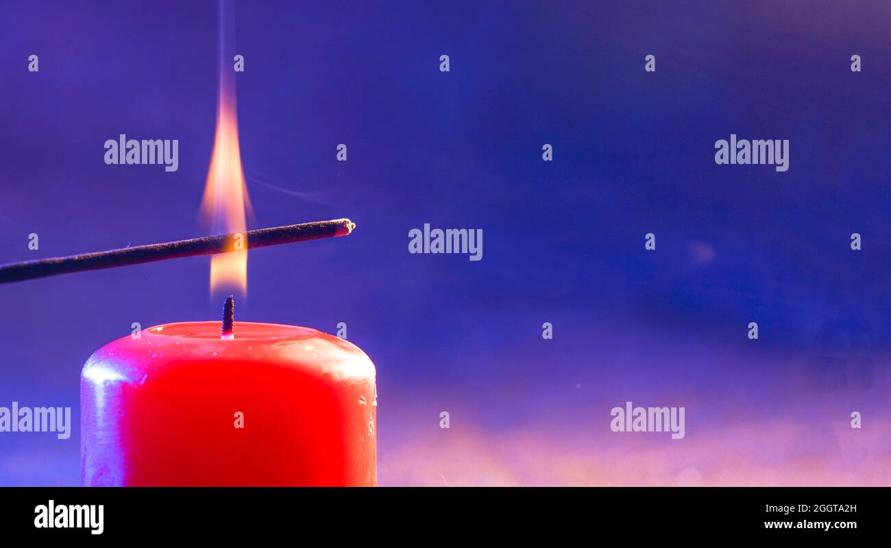 Candle with smoke and flame as a background with structure and copy ...