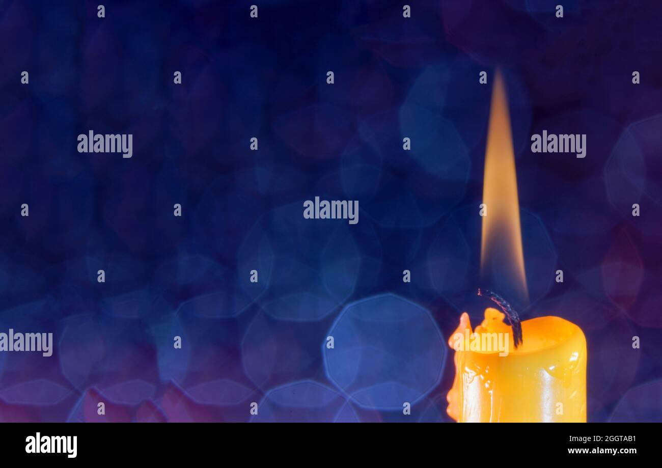 Candle with smoke and flame as a background with structure and copy ...