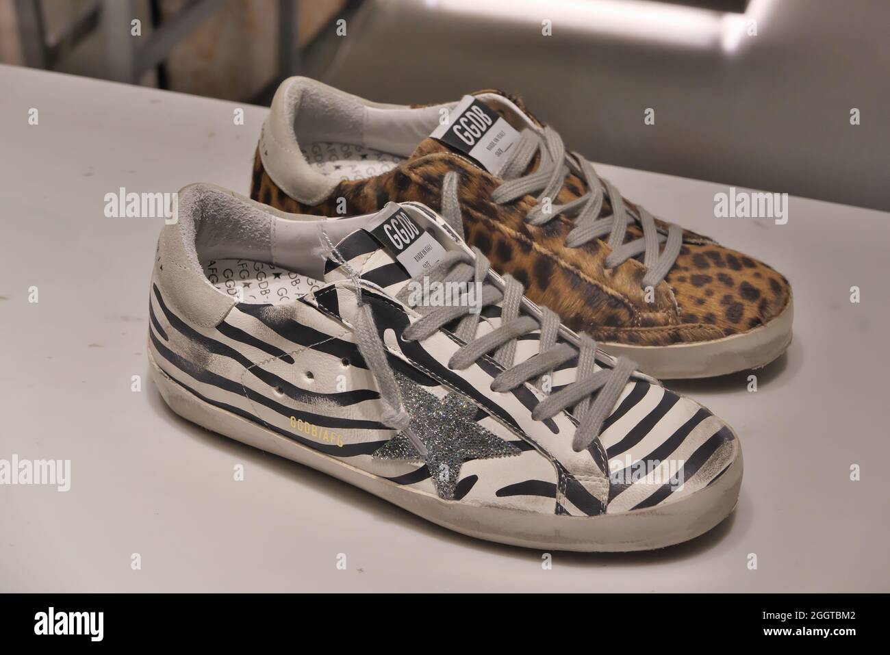 SHOES ON DISPLAY AT GOLDEN GOOSE FASHION STORE Stock Photo - Alamy