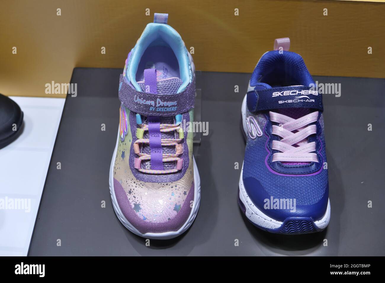 MULTICOLOR SHOES ON DISPLAY AT SKECHERS FASHION STORE Stock Photo - Alamy