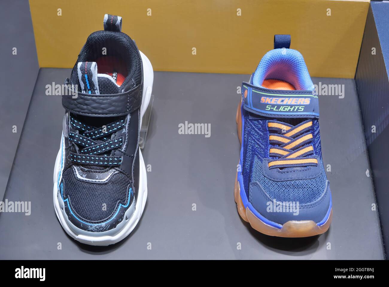 MULTICOLOR SHOES ON DISPLAY AT SKECHERS FASHION STORE Stock Photo - Alamy