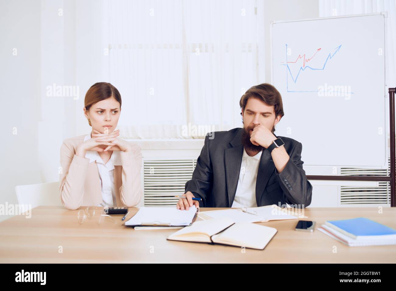 work colleagues office emotions work desk communication Stock Photo - Alamy
