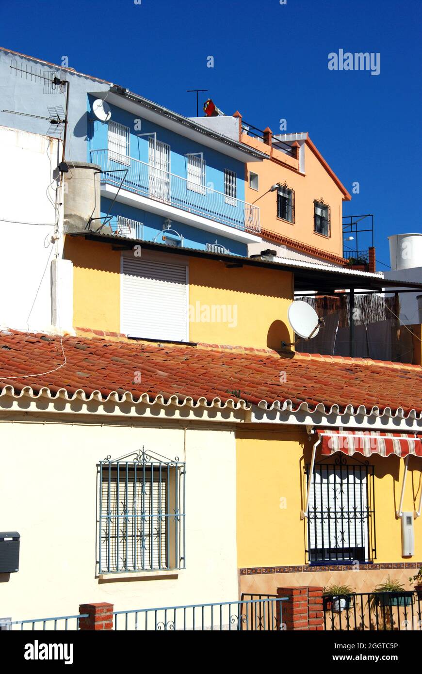 Colourful Townhouses in a traditional Spanish town, Velez Malaga, Spain ...