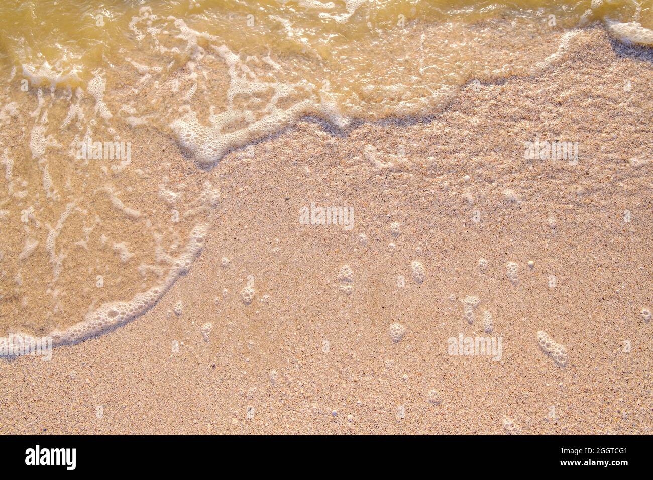 Clear sea water washes yellow hi-res stock photography and images - Alamy
