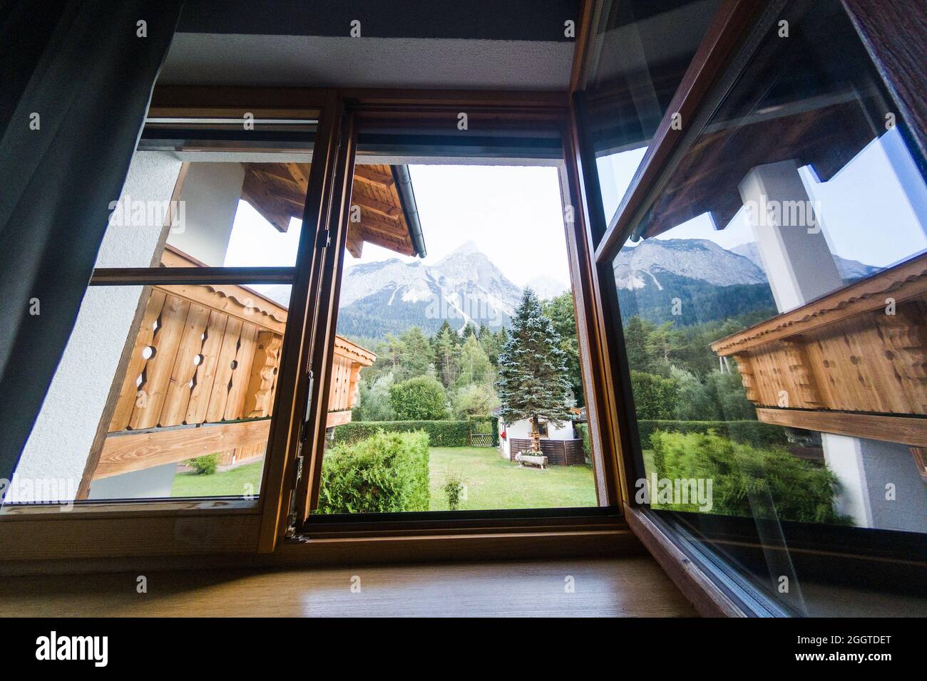 Window of alpine cottage, Tirol, Austria. View from inside Stock Photo ...