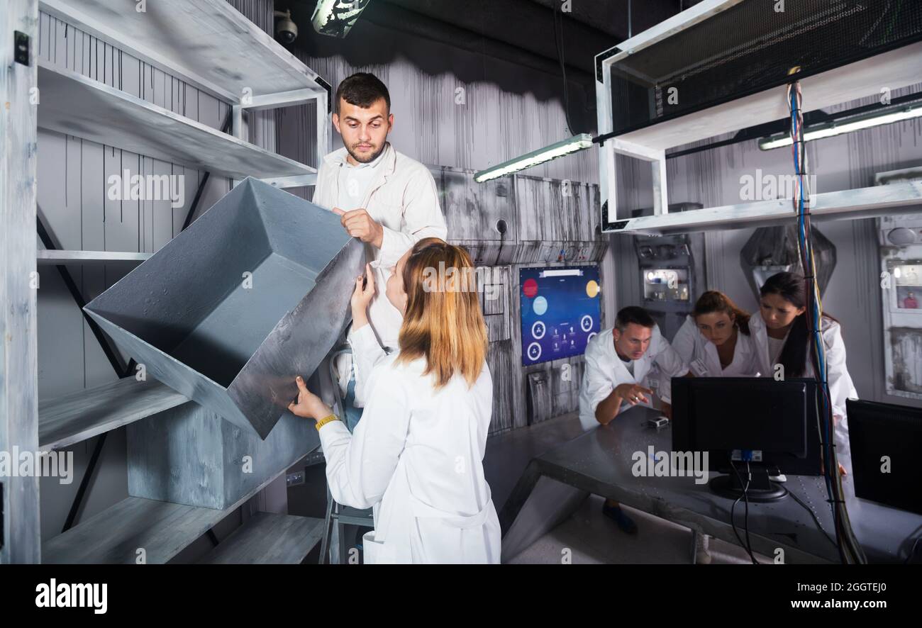 Adults in quest room Stock Photo - Alamy