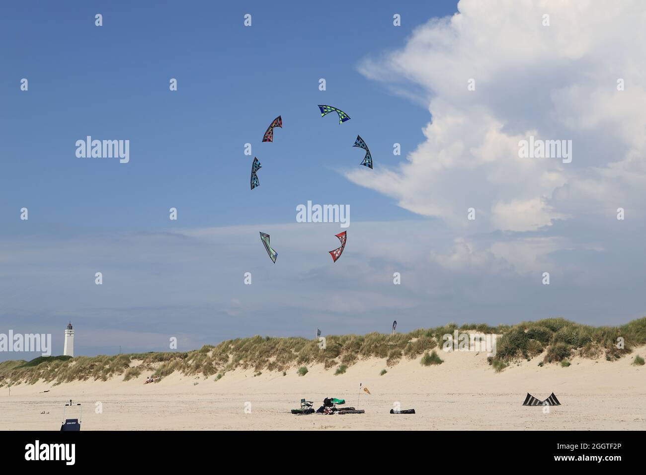 six kites fly on a blue sky Stock Photo - Alamy