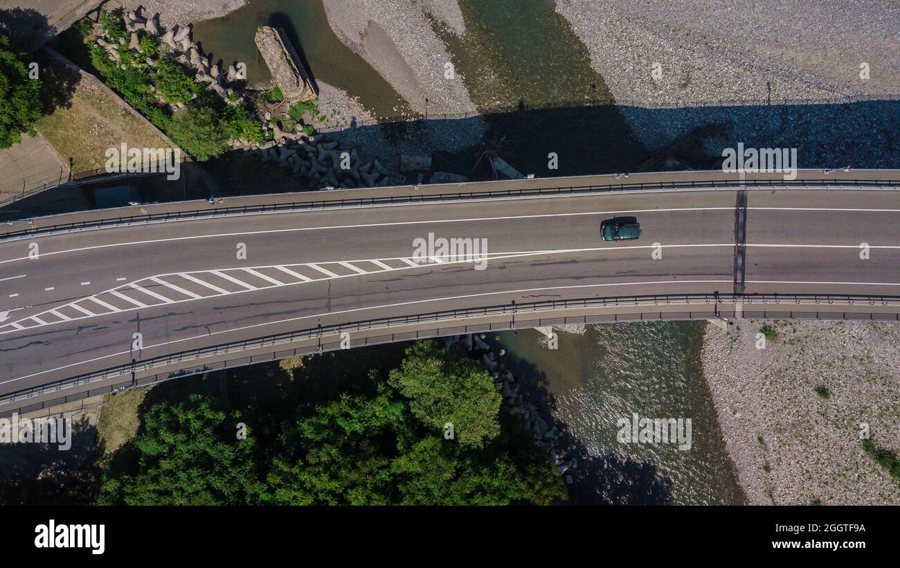 Aerial top view drone shot of bridge with cars on bridge road image ...