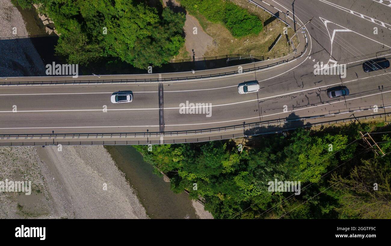 Aerial top view drone shot of bridge with cars on bridge road image ...