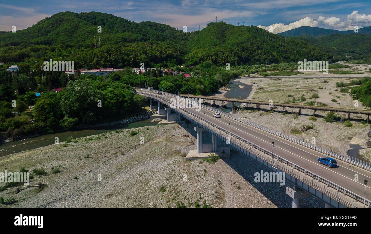 Directly above view - cars on rural bridge Stock Photo - Alamy